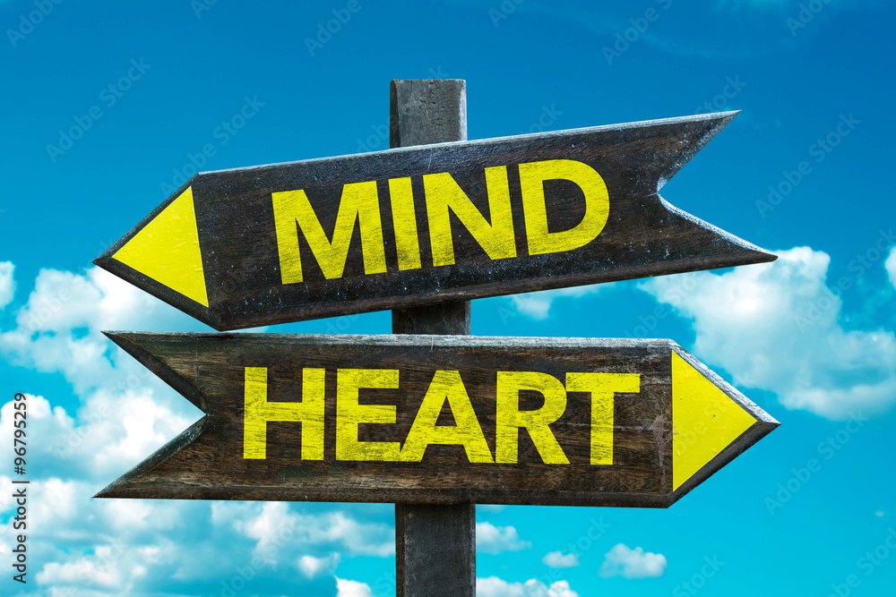Mind - Heart signpost with sky background Stock Photo | Adobe Stock