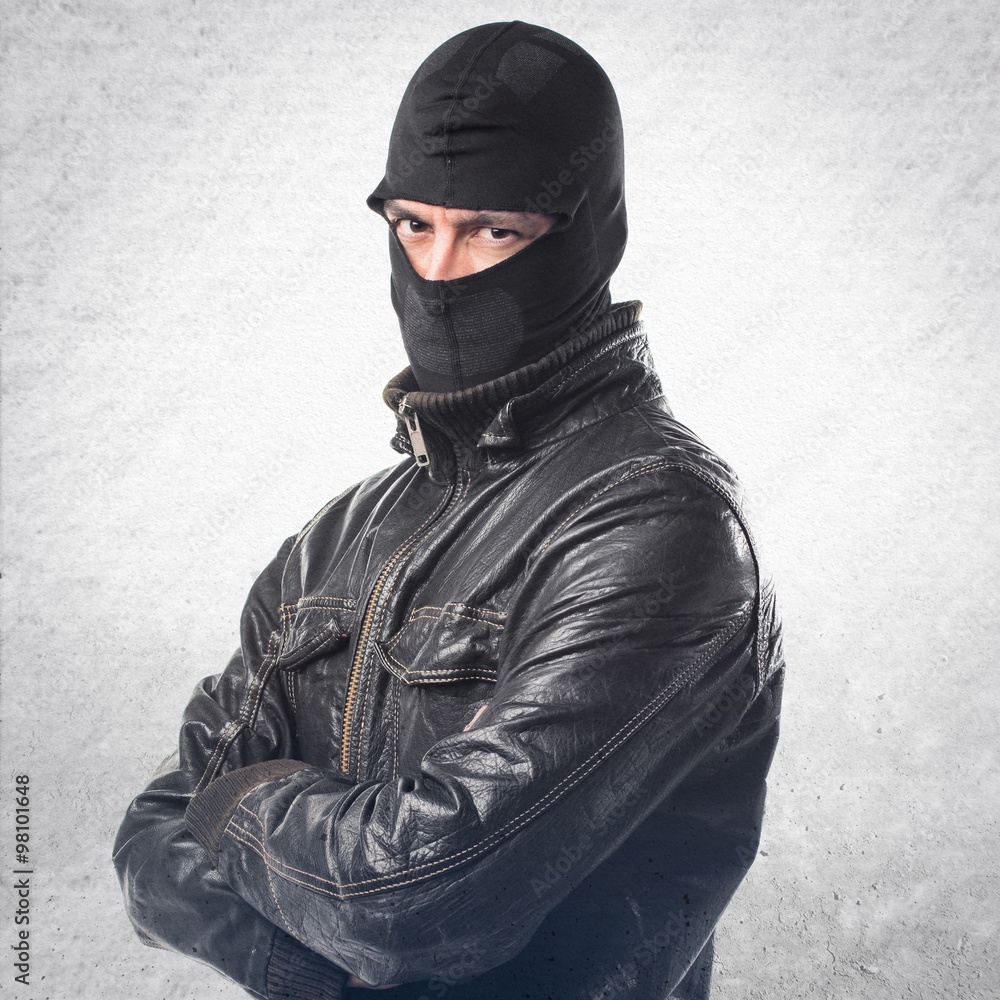 Robber with his arms crossed Stock Photo | Adobe Stock