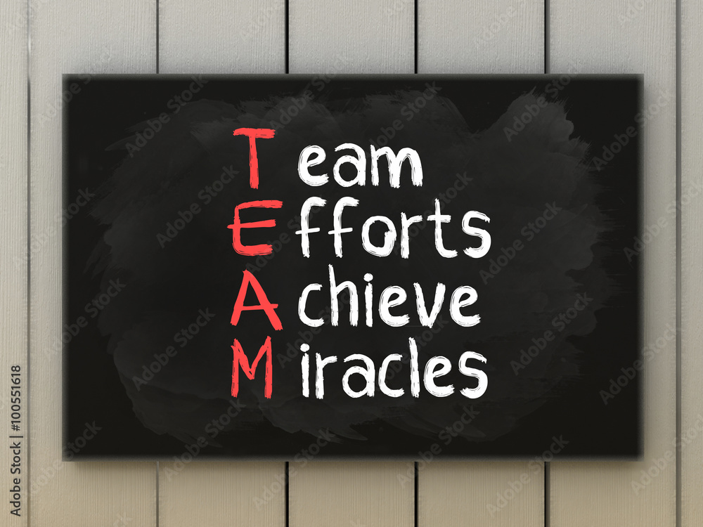 TEAM acronym on blackboard written with chalk. Team efforts achieves ...