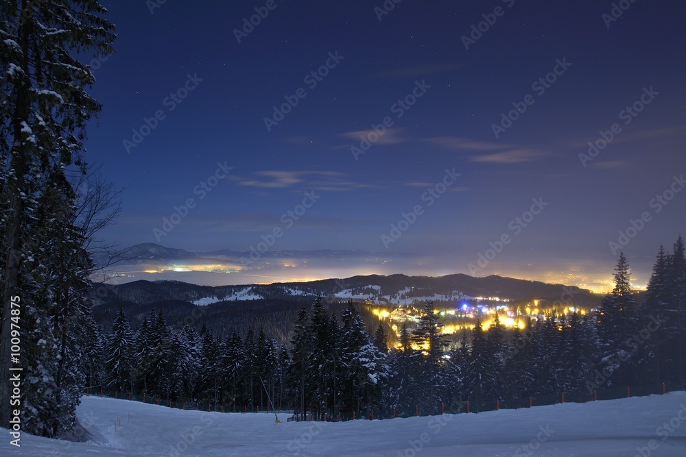 Ski slope in Poiana Brasov winter resort, Romania. Dark scenery. Night ...
