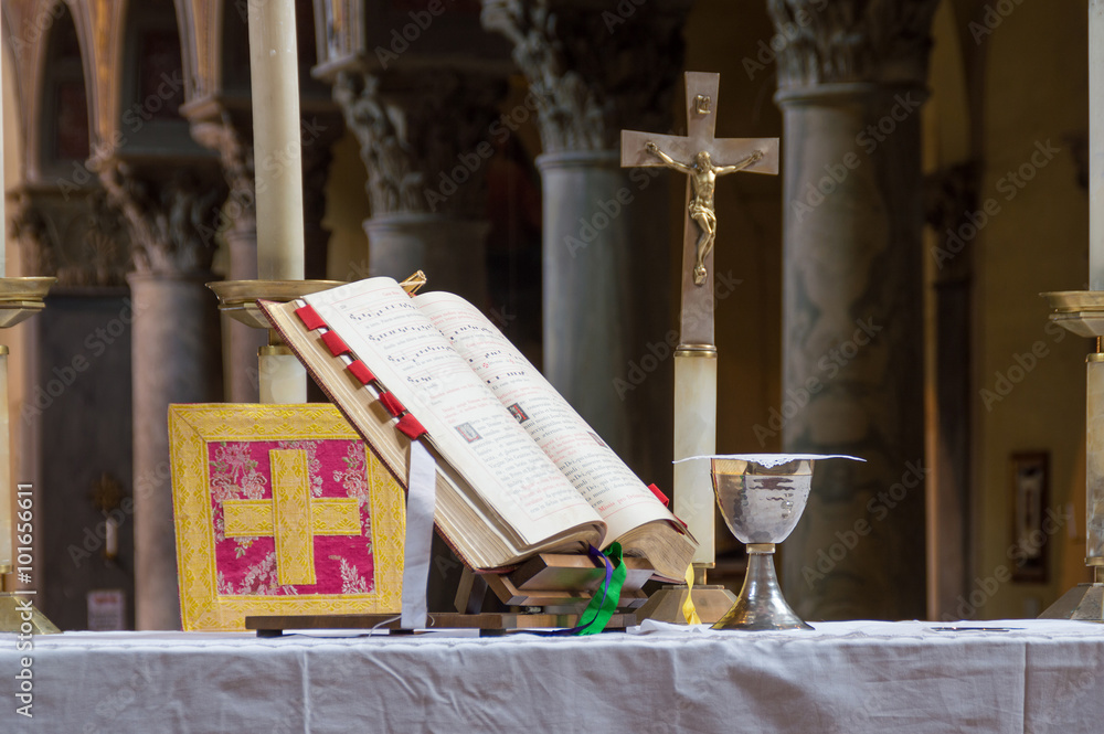 Altar with chalice and Missal during a traditional old latin rite ...