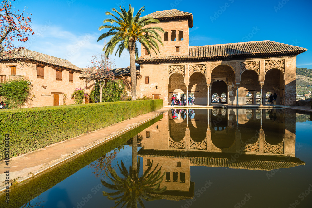 Partal Palace in La Alhambra Torre de las Damas and reflection in a ...