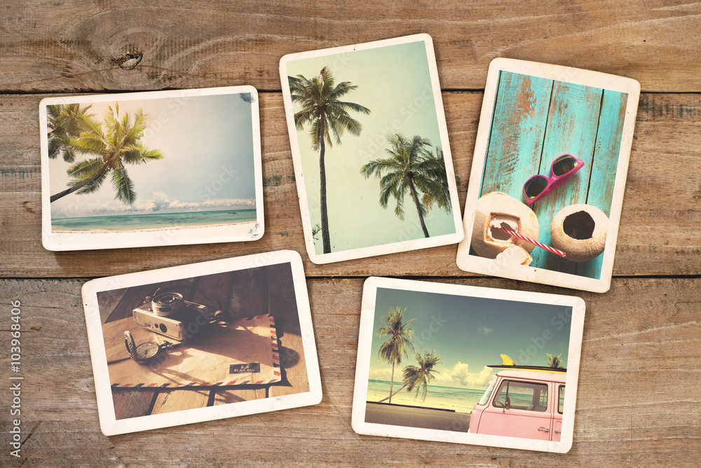 Summer photo album on wood table. instant photo of polaroid camera ...
