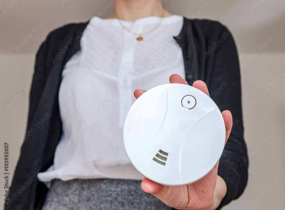 Demonstratin smoke detector - the device that senses smoke, typically ...