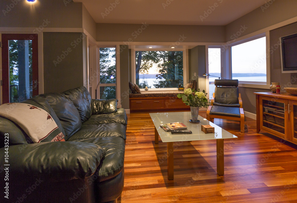 Contemporary upscale home living room interior with leather couch ...