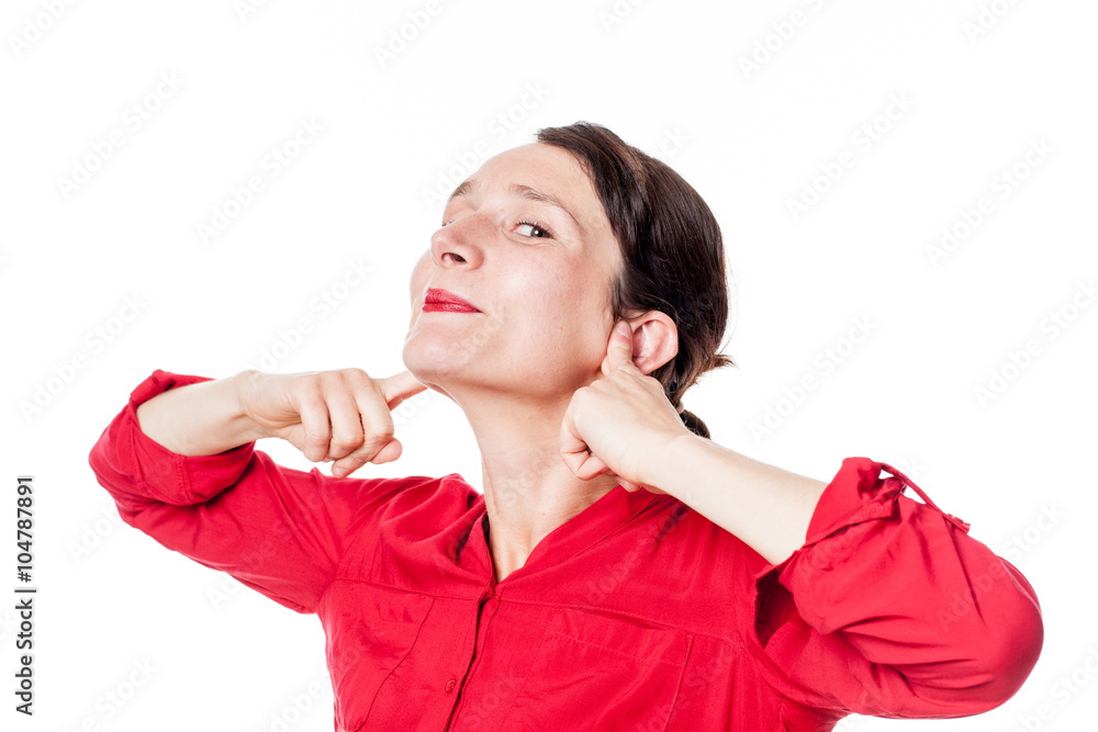noise and hearing concept - mocking young woman smiling in plugging her ...