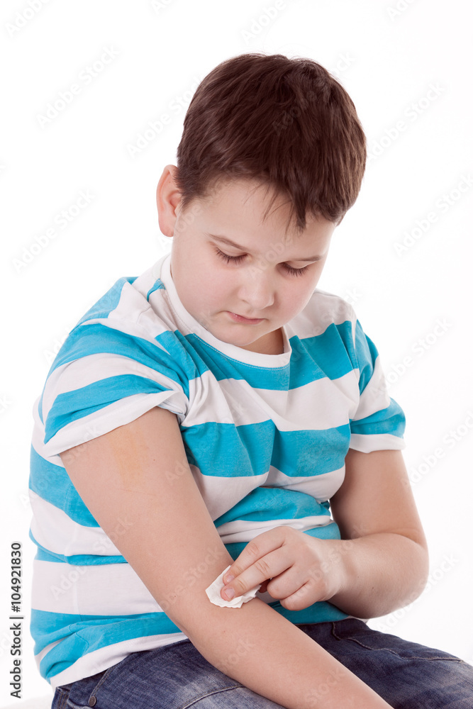 Doctor giving a child injection in arm on isolated image. Stock Photo ...