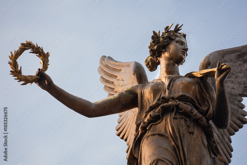 Bronze angel of Victory statue, holding olive branch, Prague Stock ...