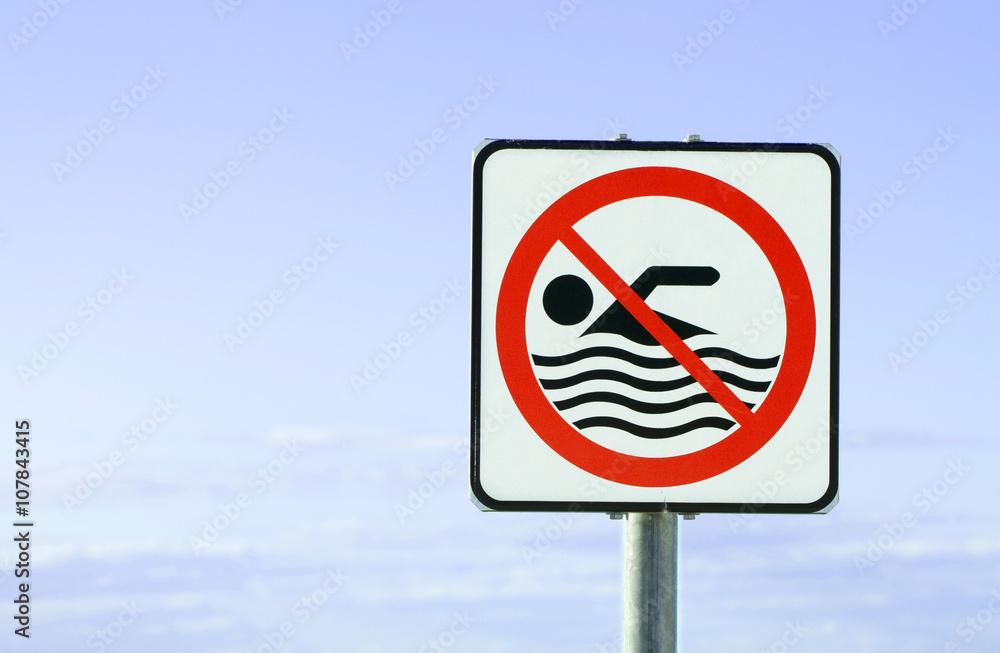 An European warning sign at the beach with man swim and not symbol ...