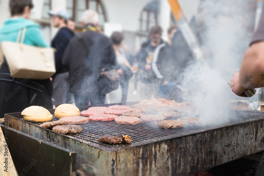 Chef making beef burgers outdoor on open kitchen international food ...