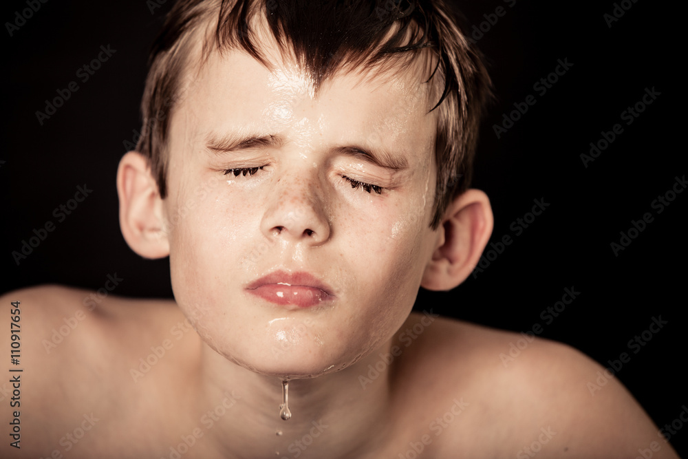 Shirtless boy splashes water on his face Stock Photo | Adobe Stock