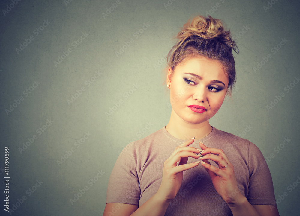 Sneaky, sly, scheming young woman plotting something. Negative human ...