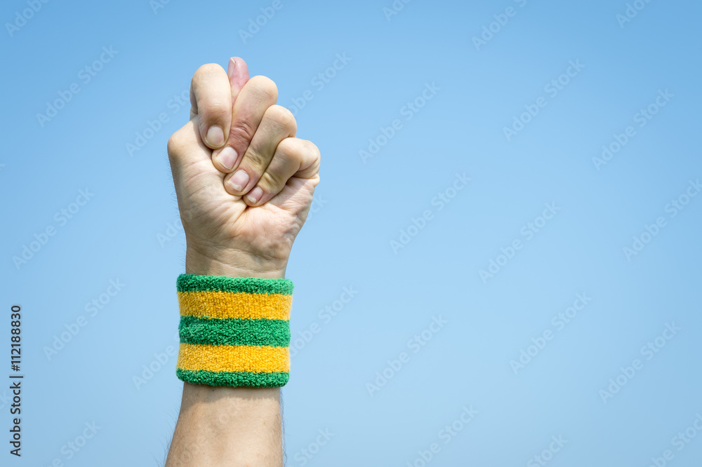 Brazilian good luck hand sign known as the figa with the thumb poking ...