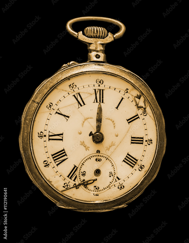 Antique silver broken pocket watch isolated on a pure black background ...