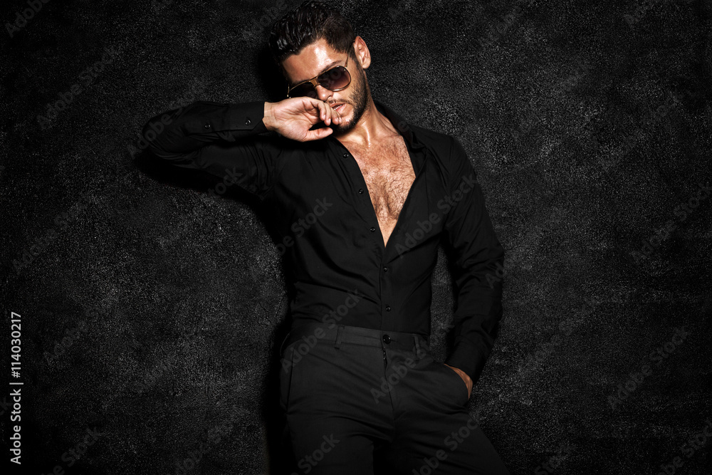Stock-Foto „Handsome man posing, night life.“ | Adobe Stock