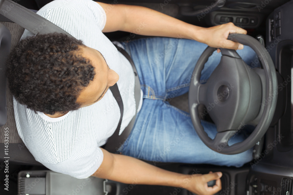 Man driving, view from above Stock Photo | Adobe Stock