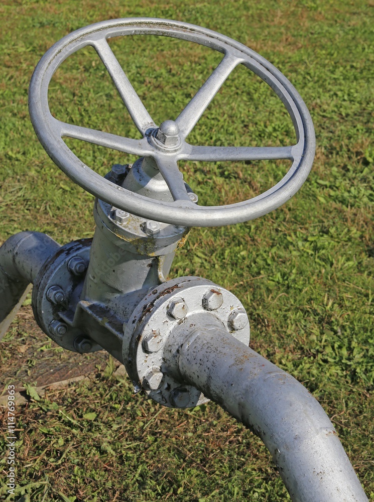 big valve with a sliding part that controls the extent of the ap Stock ...