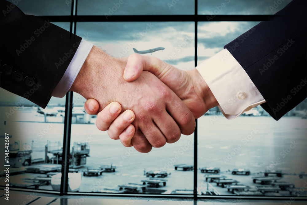 Business handshake on International Airport Terminal background Stock ...