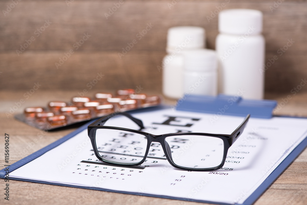 Healthy eyes. Eye chart and medicine Stock Photo | Adobe Stock