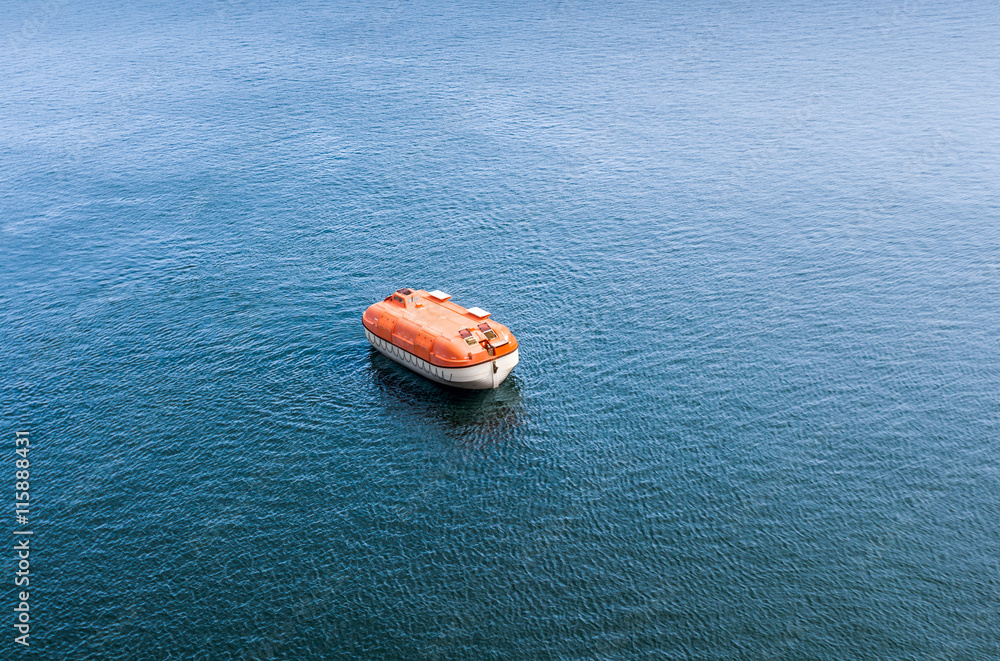 Lifeboat of enclosed and rigid type awaiting rescue during exercises of ...