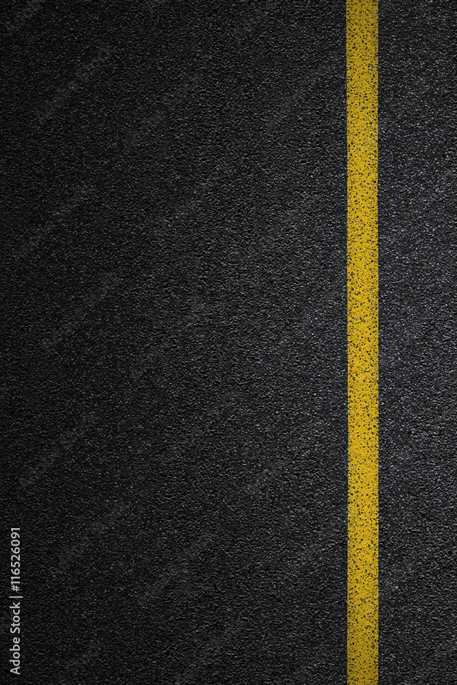 Level asphalted road with a dividing yellow stripes. The texture of the ...