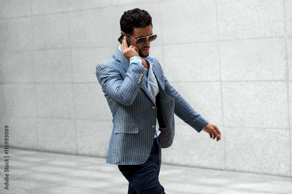 Stock-Foto „Portrait of an handsome businessman in an urban setting ...