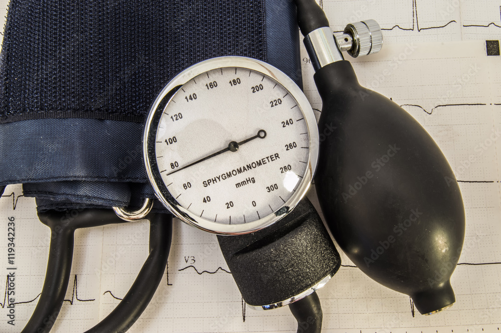 Aneroid sphygmomanometer with dial, bulb, air valve and a folded cuff ...