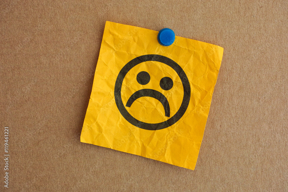 Paper note with sad face Stock Photo | Adobe Stock