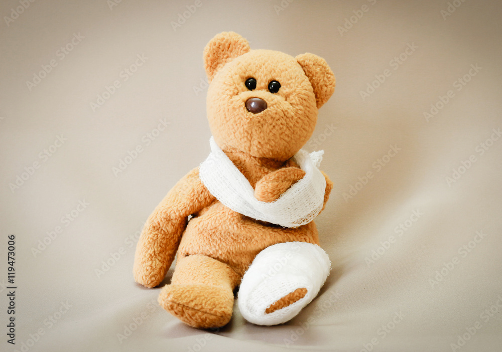 Teddy bear with bandage Stock Photo | Adobe Stock