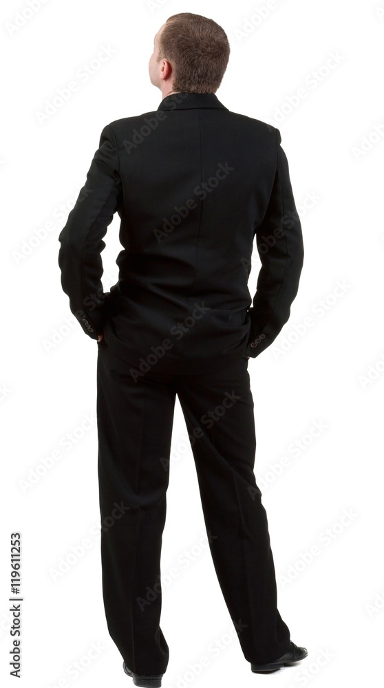 backside view of person. back view of Businessman looks ahead. Young ...