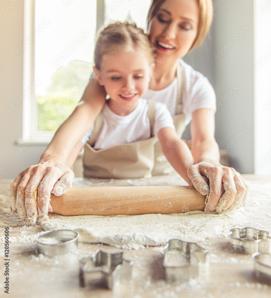 Mother and daughter baking Stock Photo | Adobe Stock