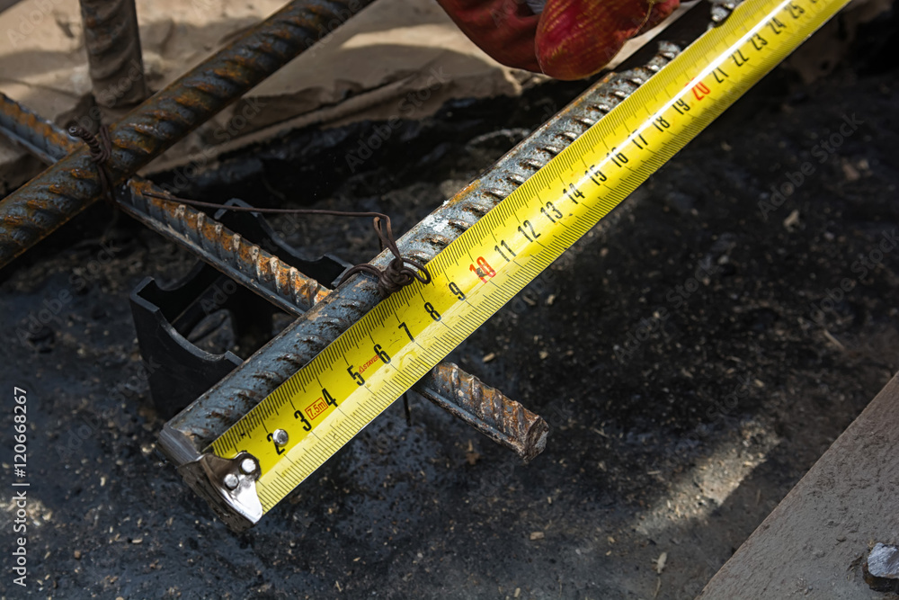 Tape measure at construction spot Stock Photo | Adobe Stock