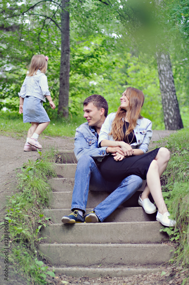 Family on a walk, mom and dad sitting on the stairs, and my daughter ...