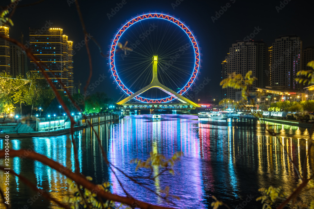 Tianjin Eye is a 120-metre (394 ft) tall giant Ferris wheel built above ...