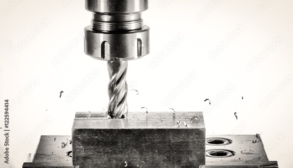 cnc milling machine - spindle with cutter, flying metal splinter Stock ...
