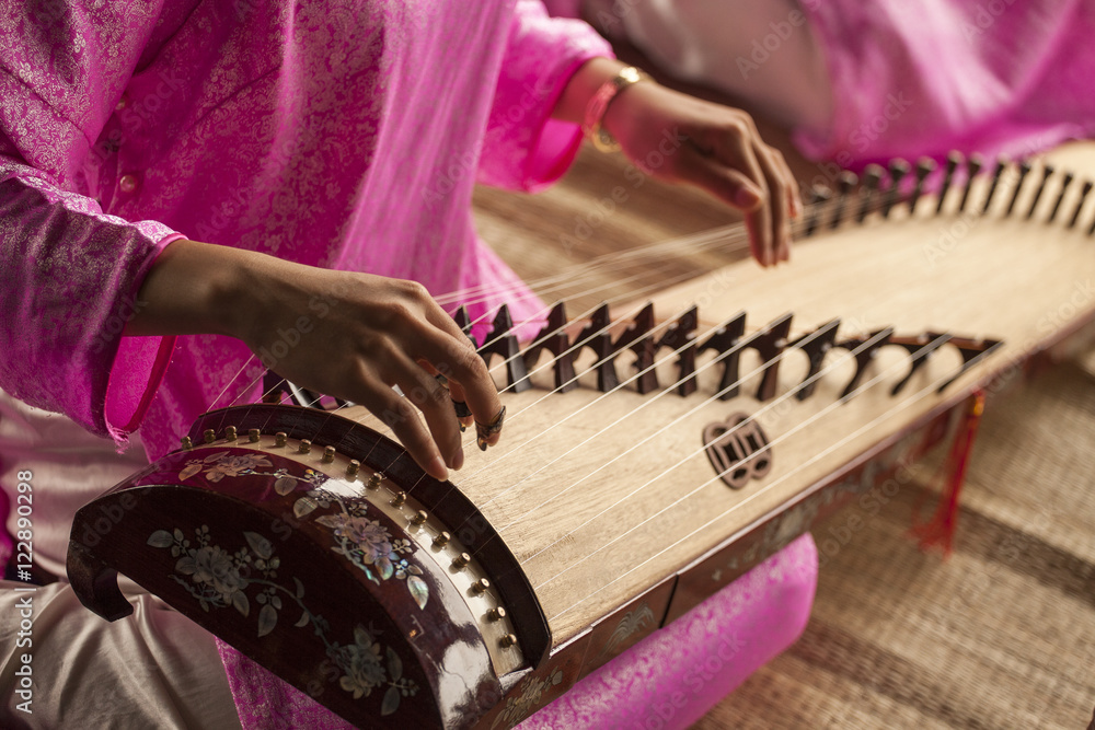 Woman Play A Traditional Korean String Instrument The Gayageum Stock