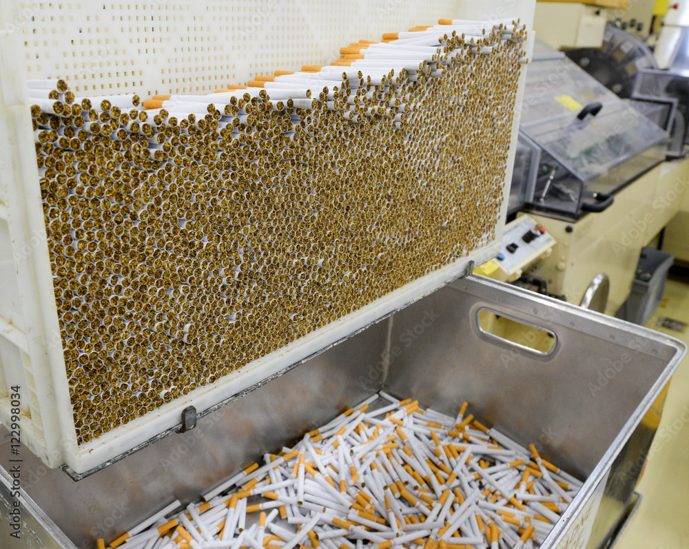 Cigarettes production and packing Stock Photo | Adobe Stock