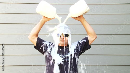 Video Stock Got Milk anyone? Humorous clip of man pouring two gallons ...