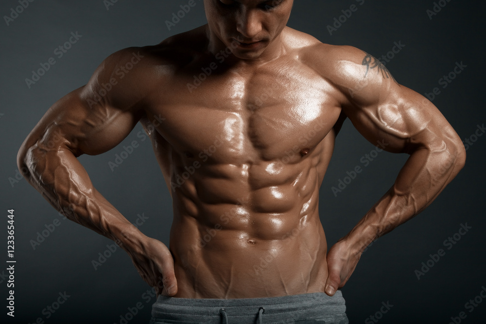 Strong Athletic Man Fitness Model Torso showing six pack abs. Stock Photo | Adobe Stock