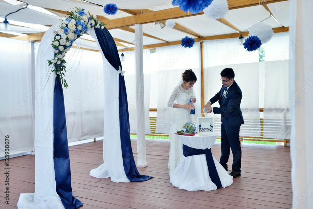 Beauty bride and handsome groom are registering the marriage. Wedding ...