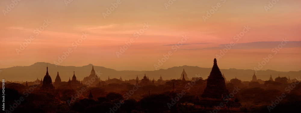 Amazing sunset over ancient architecture of old Buddhist Temples at ...