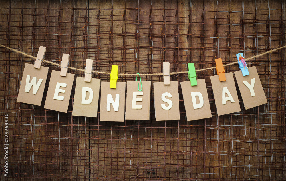 word Wednesday design by white letterpress with box paper hang on rope ...