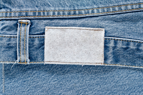 Jeans background texture,Blank real leather jeans label sewed on old ...