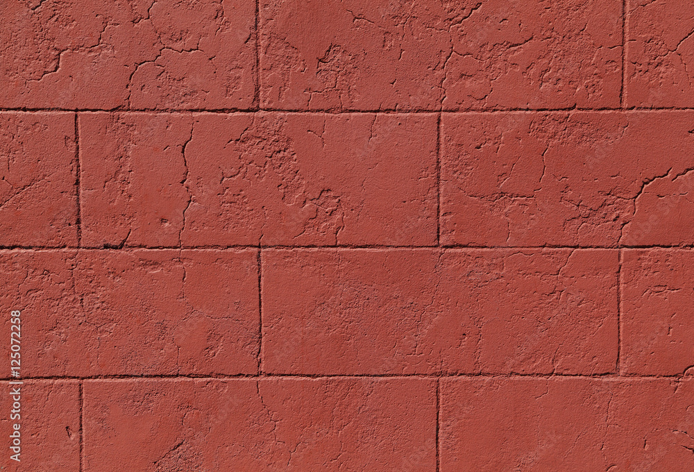 Red cinder block wall forms a pattern that can be used for backgrounds ...