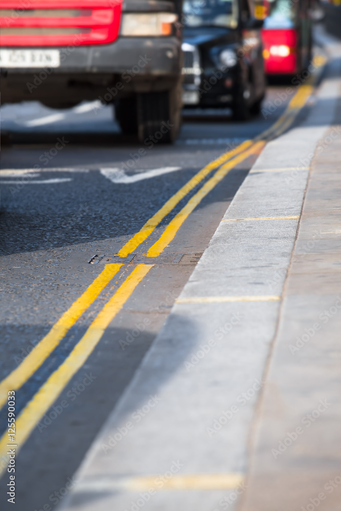 Street and Pavement / Double yellow line at the dangerous road with ...