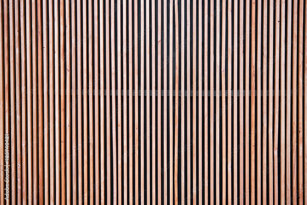 Wood cladding wall which various tone texture of wooden stripes use as ...
