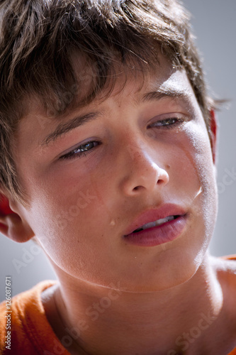 Portrait of a teenager crying inconsolably - Buy this stock photo and ...