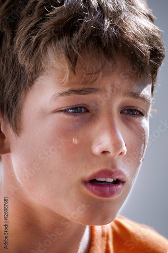 Portrait of a teenager crying inconsolably - Buy this stock photo and ...