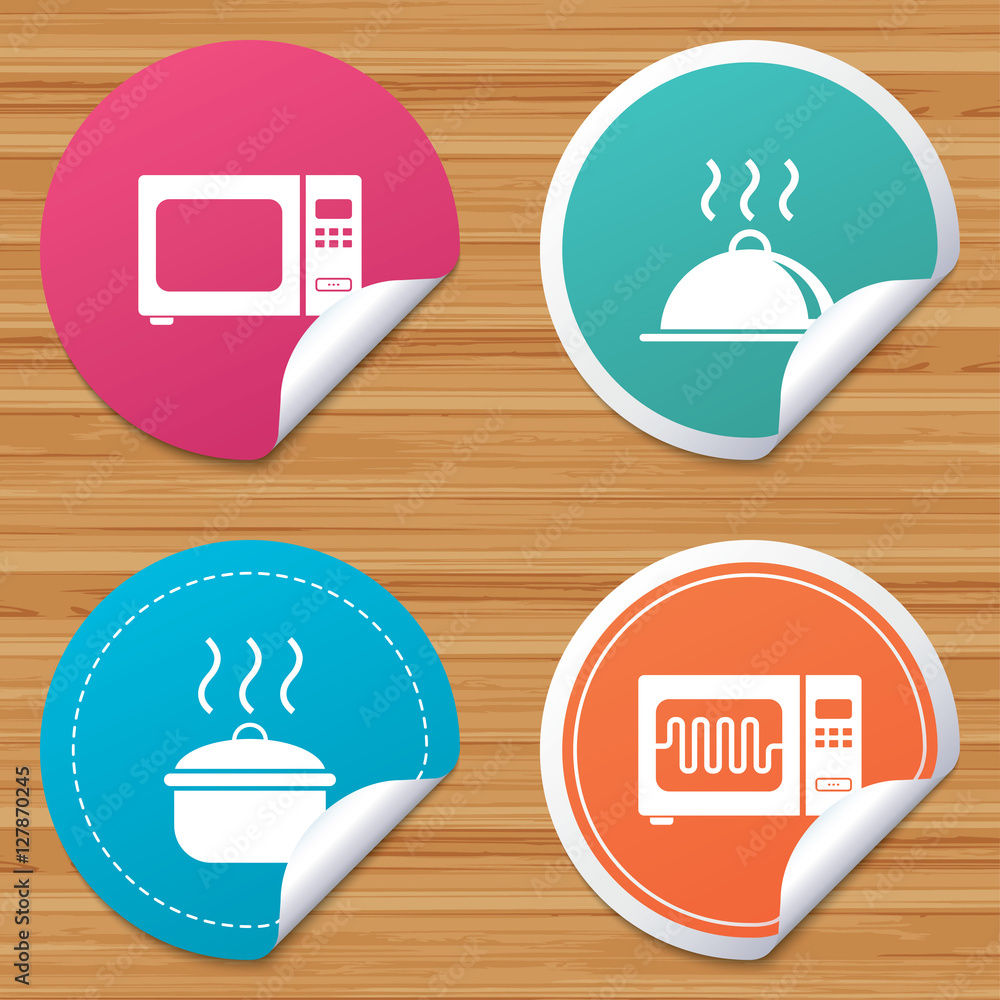 Stock-Vektorgrafik „Round stickers or website banners. Microwave grill ...