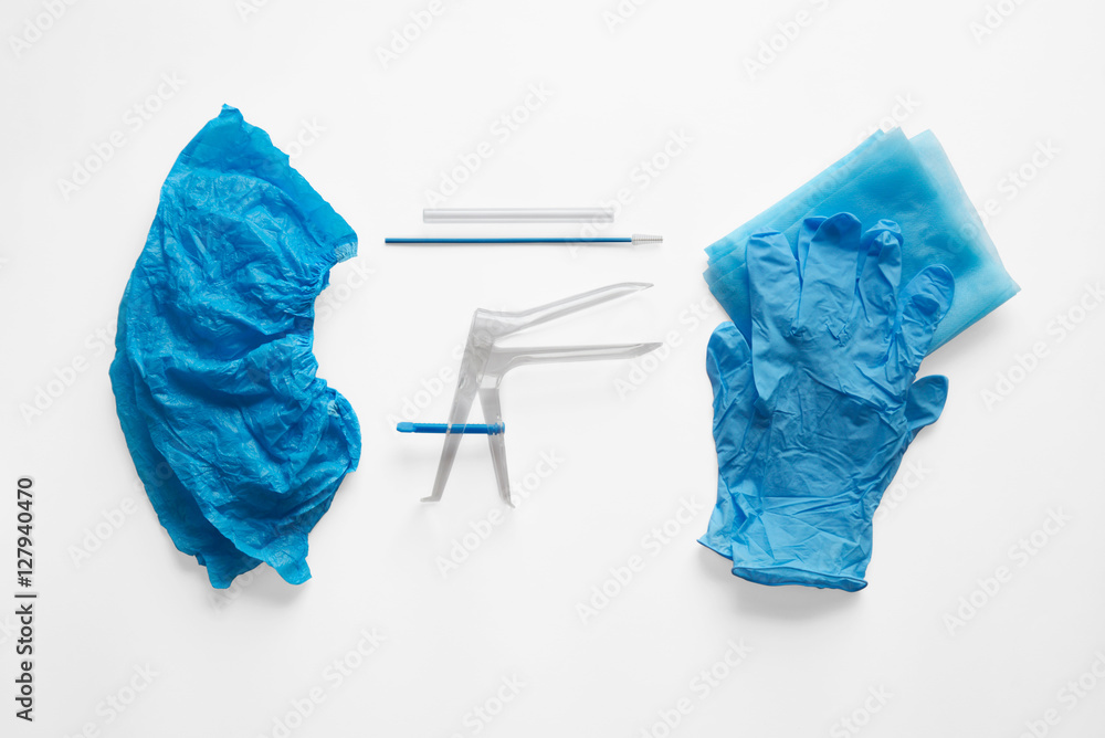 Disposable set for gynecological examination. From left to right are ...